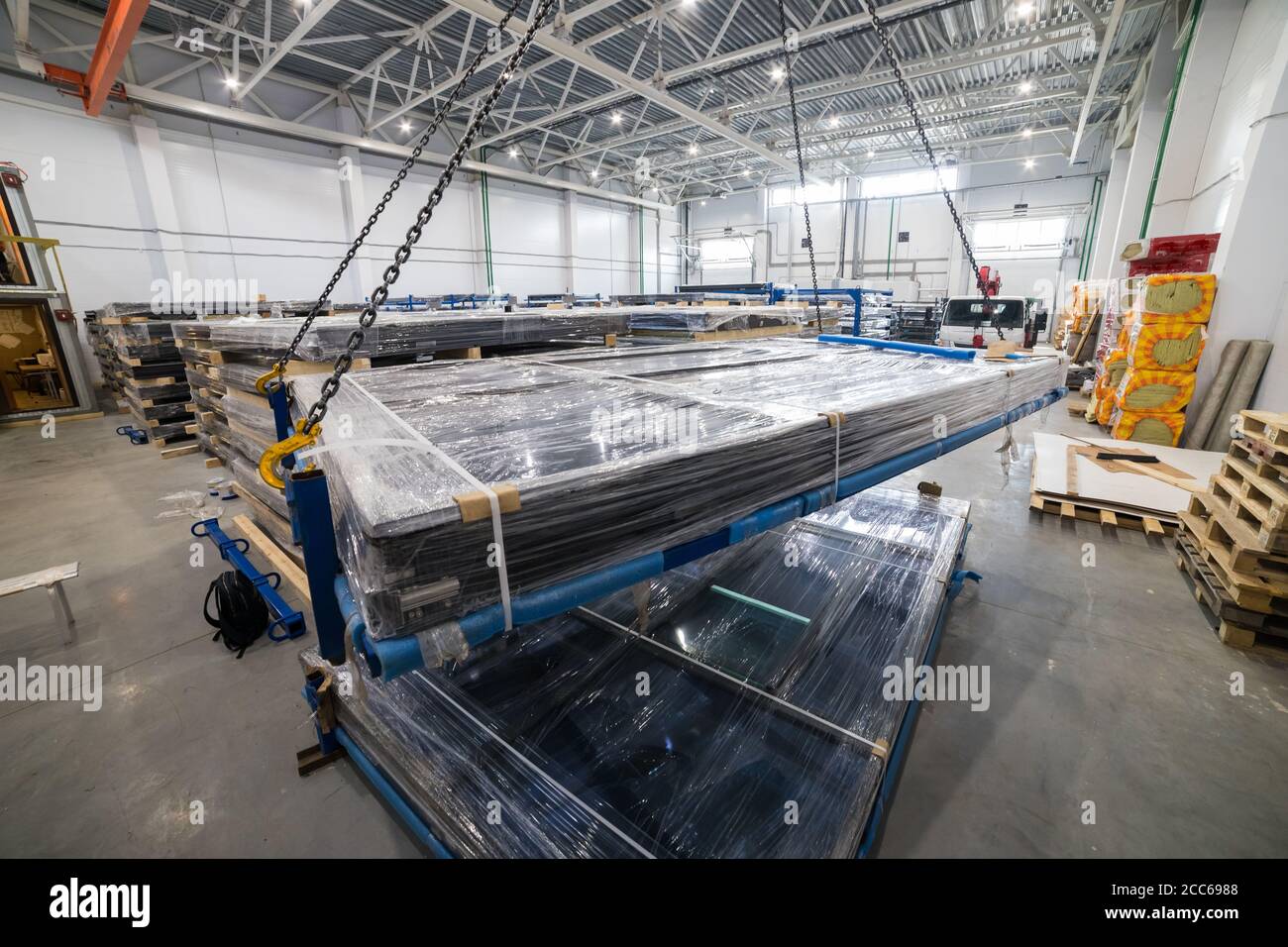 Shipping the plastic windows from the warehouse packed in polyethylene ...