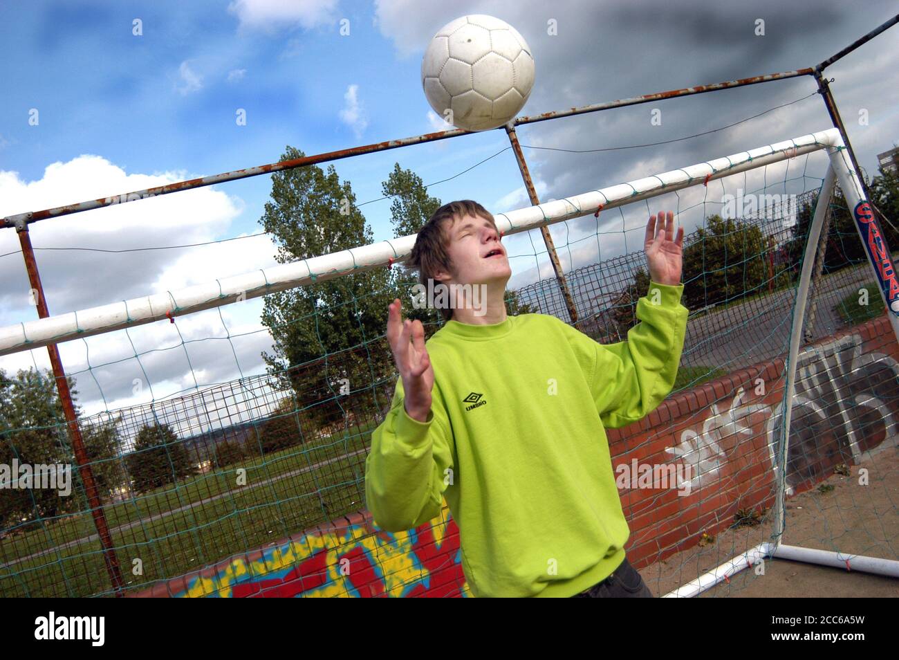 Boy playing football england uk hi-res stock photography and images - Alamy