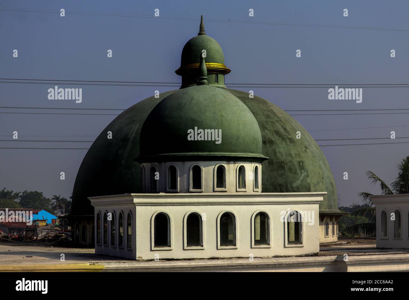 two parallel domes of the mosque and dark green Stock Photo - Alamy