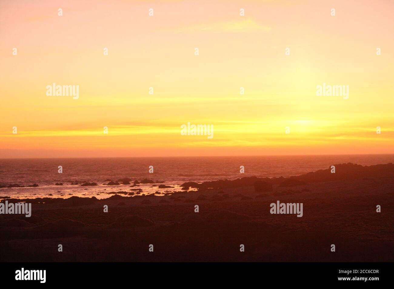 Sunset at the beach Stock Photo - Alamy