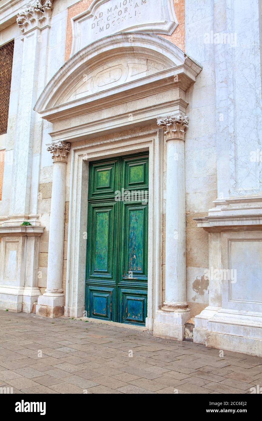 Entrance of Catholic Church with Green Wooden Door Stock Photo - Alamy