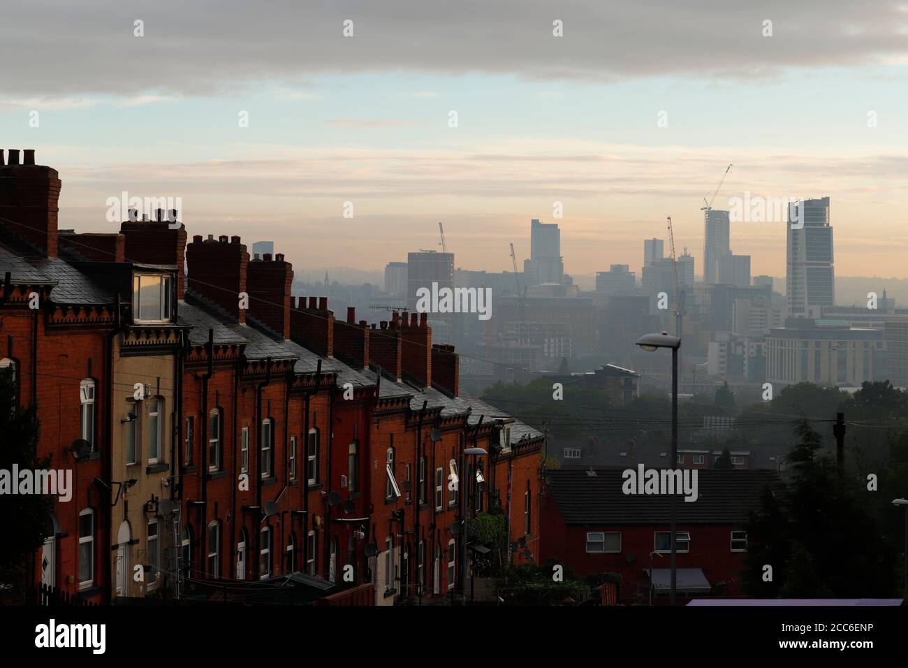Back to back housing in Leeds with the constant changing skyline of ...
