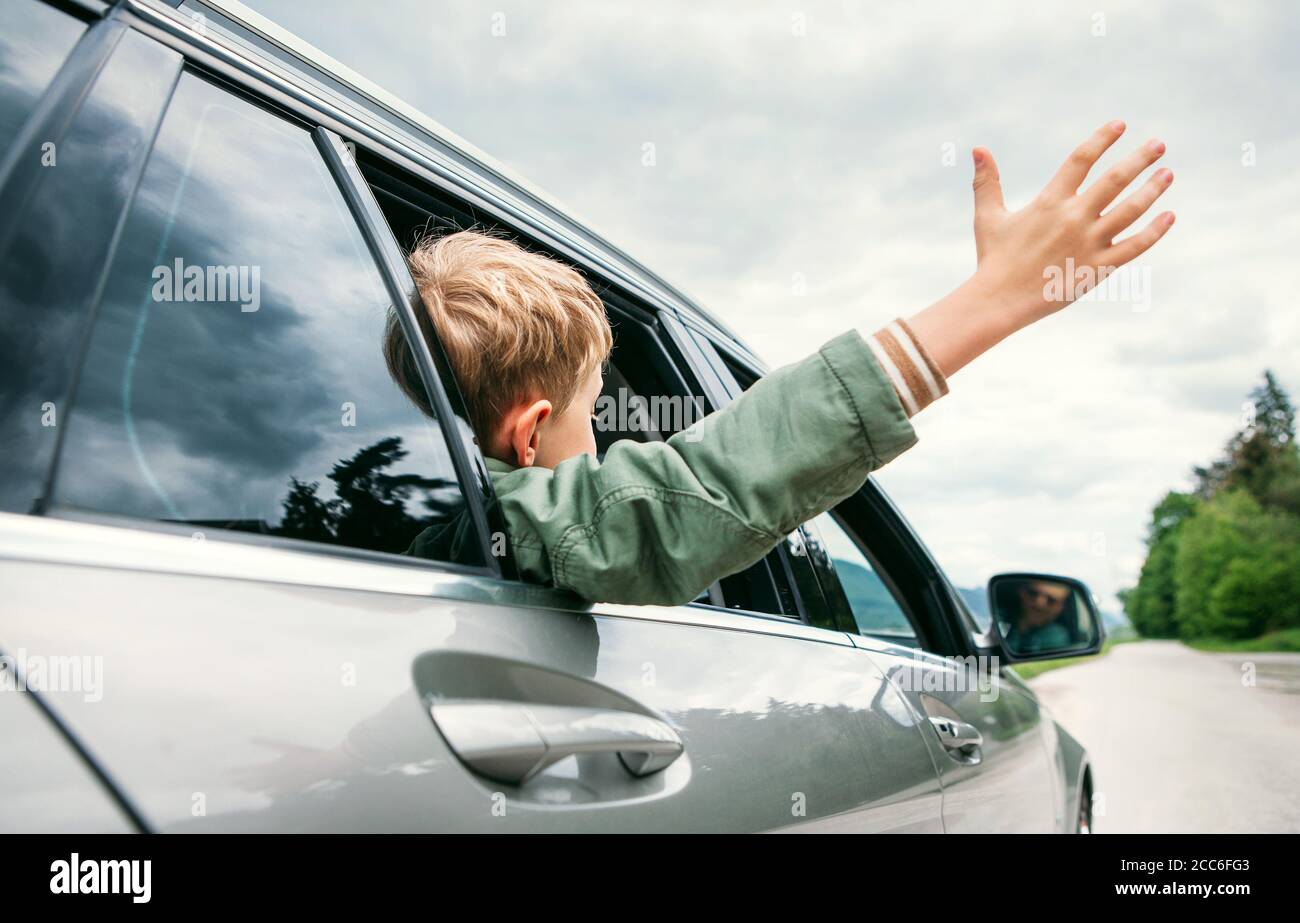 Family waving from window hi-res stock photography and images - Alamy
