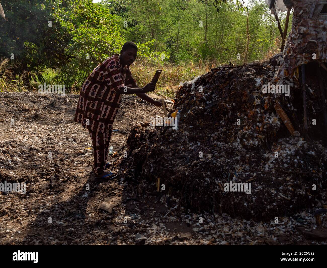 Dankoli/Benin - 01/01/2020 - Unidentified man does some rituals as a ...