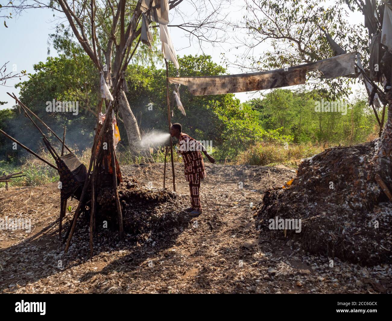 Dankoli/Benin - 01/01/2020 - Unidentified man does some rituals as a ...