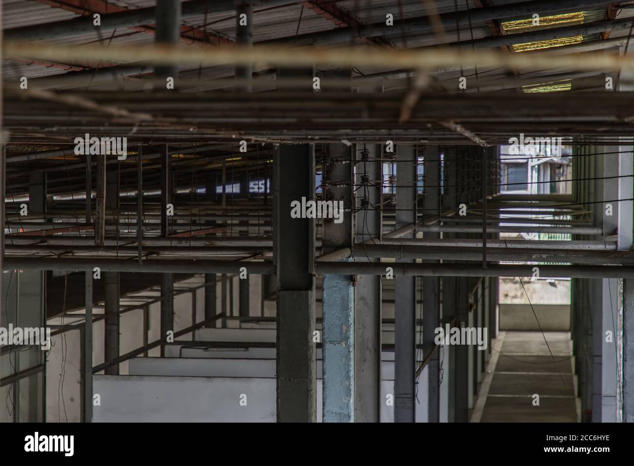 The structure inside the warehouse with light pole. Old structure in ...
