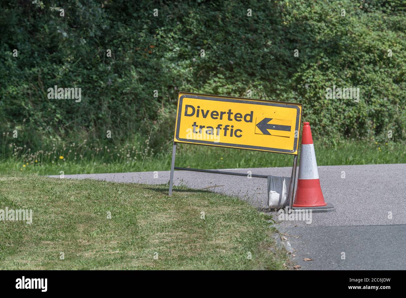 UK road transport system. Diverted traffic sign with directional arrow ... UK road transport system. Diverted traffic sign with directional arrow ...