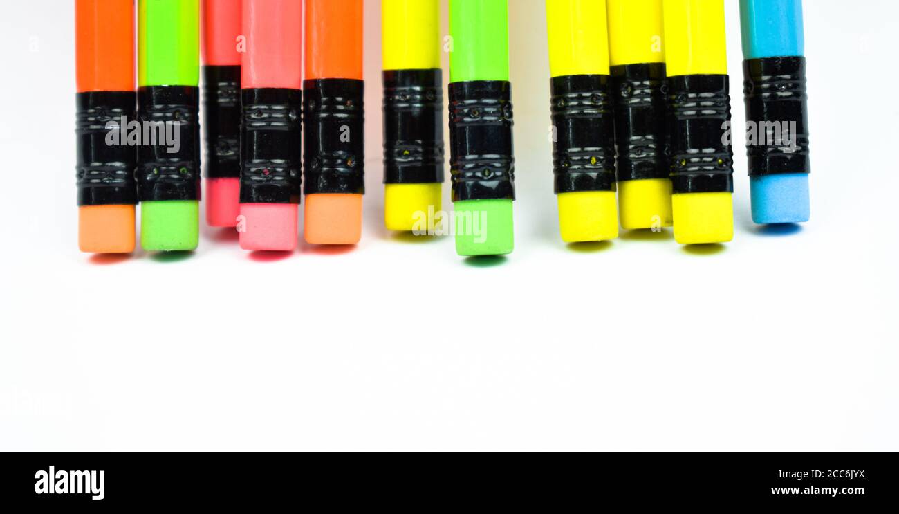 Back side of some different colored wood pencil crayons with rubber ...