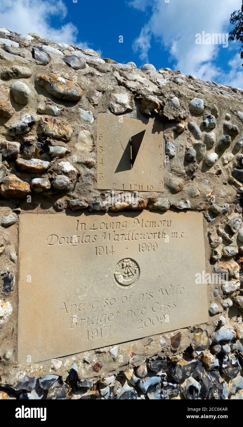 A plaque with a sundial on the memorial wall at Saint Margaret's Church ...