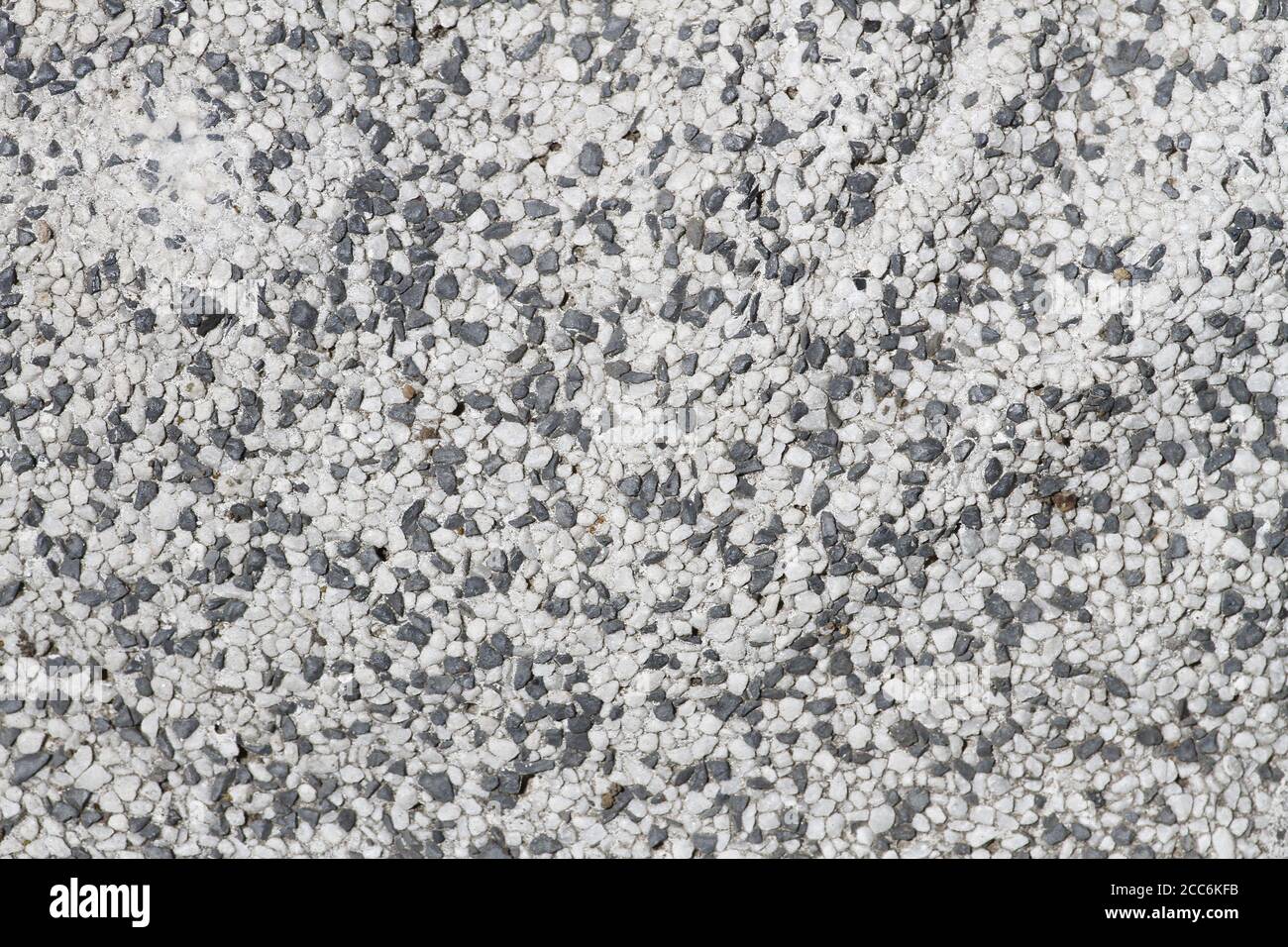 Concrete, plaster, wall covering, flooring made of small pebbles ...