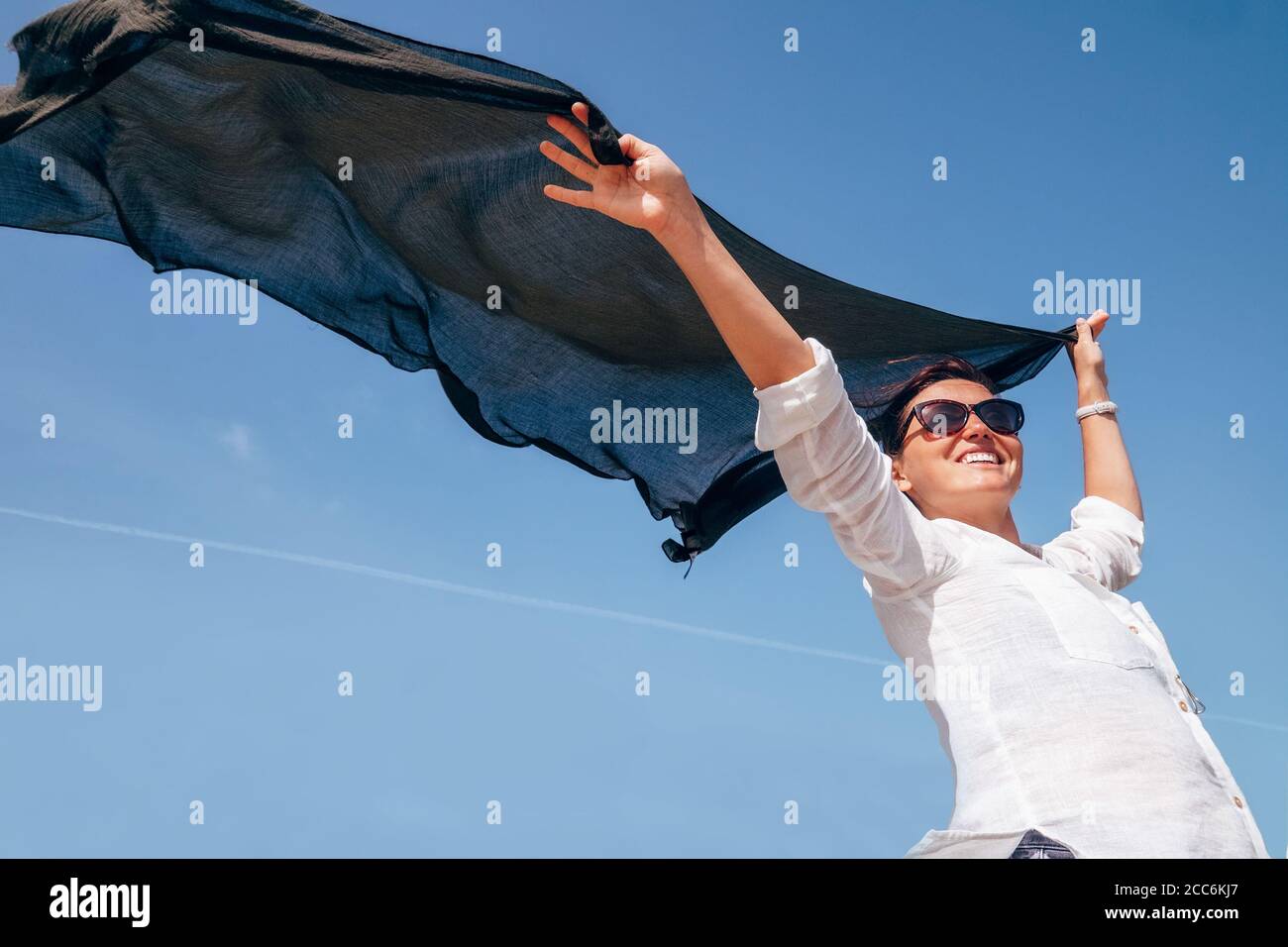 Wind fly woman hi-res stock photography and images - Alamy