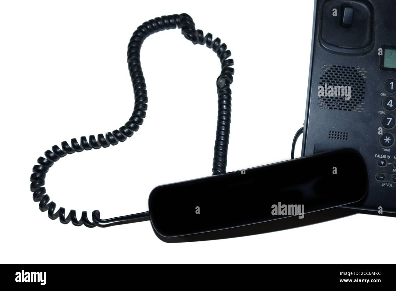 Black old fashioned telephone receiver isolated on a white backgrounds ...