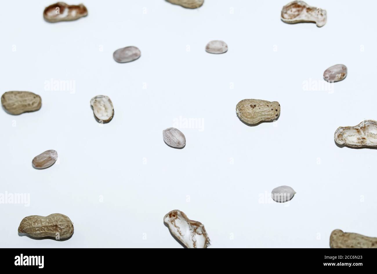 Top view of Peanuts hulls nut shell and peeled peanuts isolated on ...