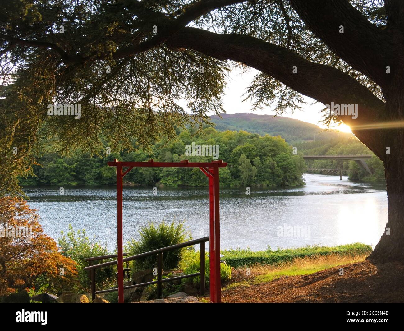 Scottish scenery: a sunset over Loch Faskally with the A9 road bridge ...