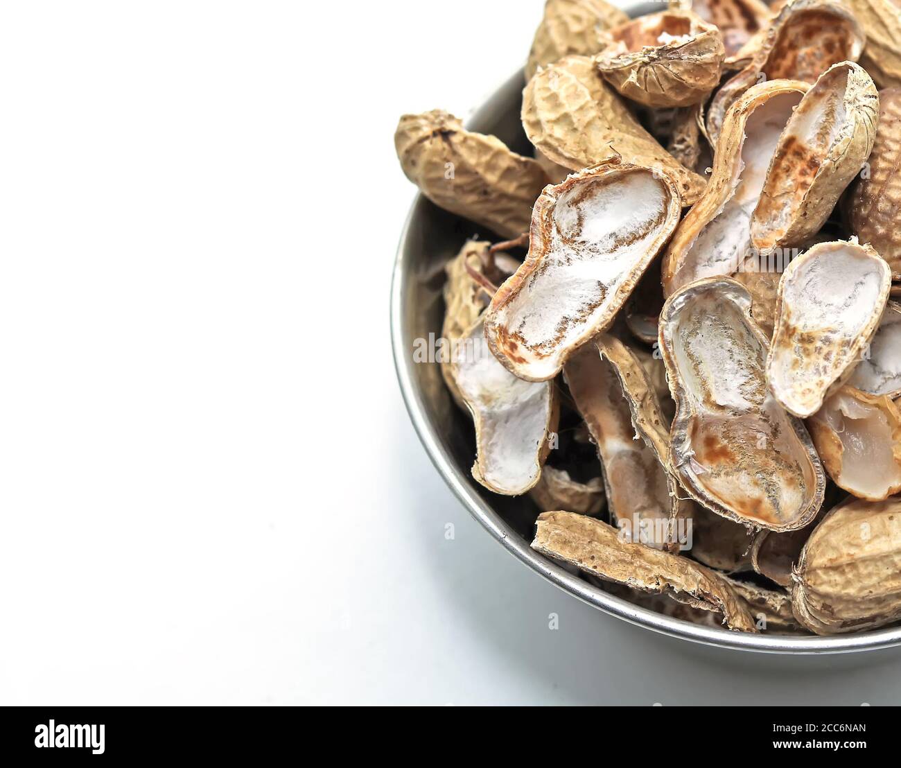 A bunch of Peanut shells on a white backgrounds Stock Photo - Alamy