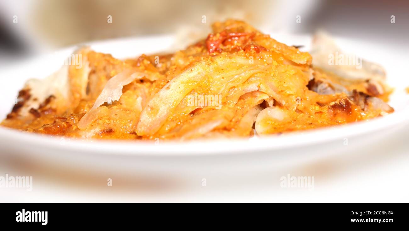 Parotta and Chicken Curry - This is parotta a layered flatbread made ...