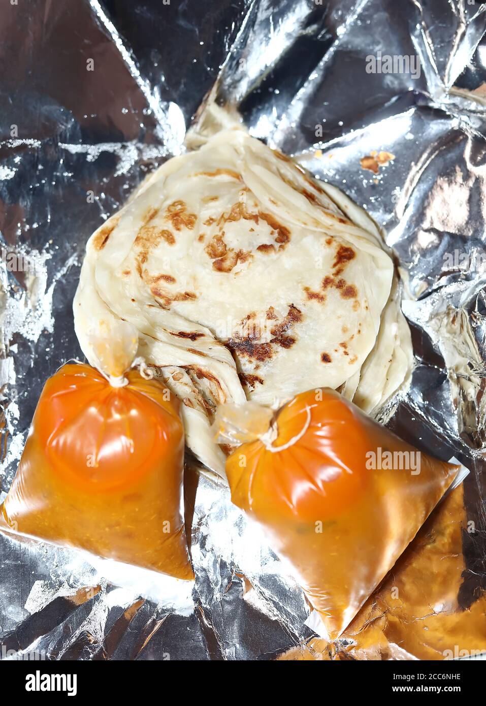 Parotta with Chicken kurma, paratha kurma is a delicacy from the state ...
