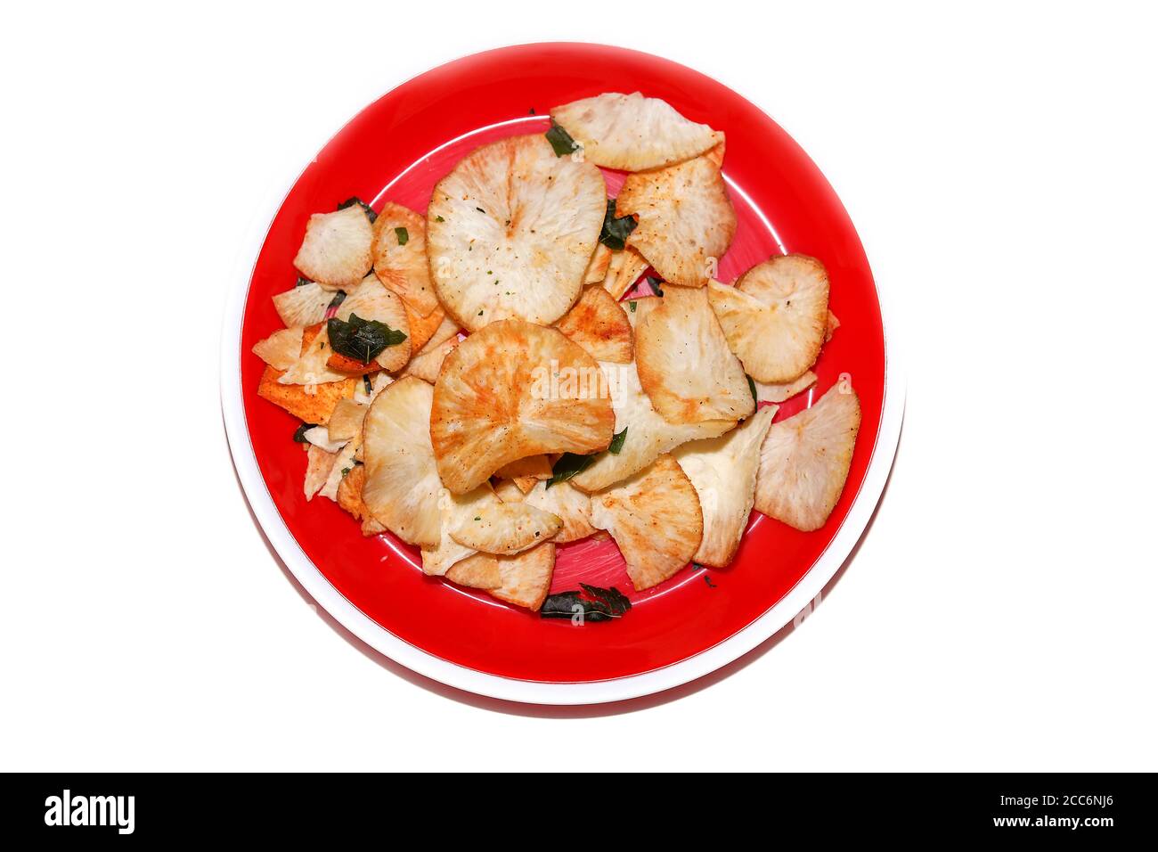 Fried slice tapioca, Tapioca chips in the plate on the top of white ...