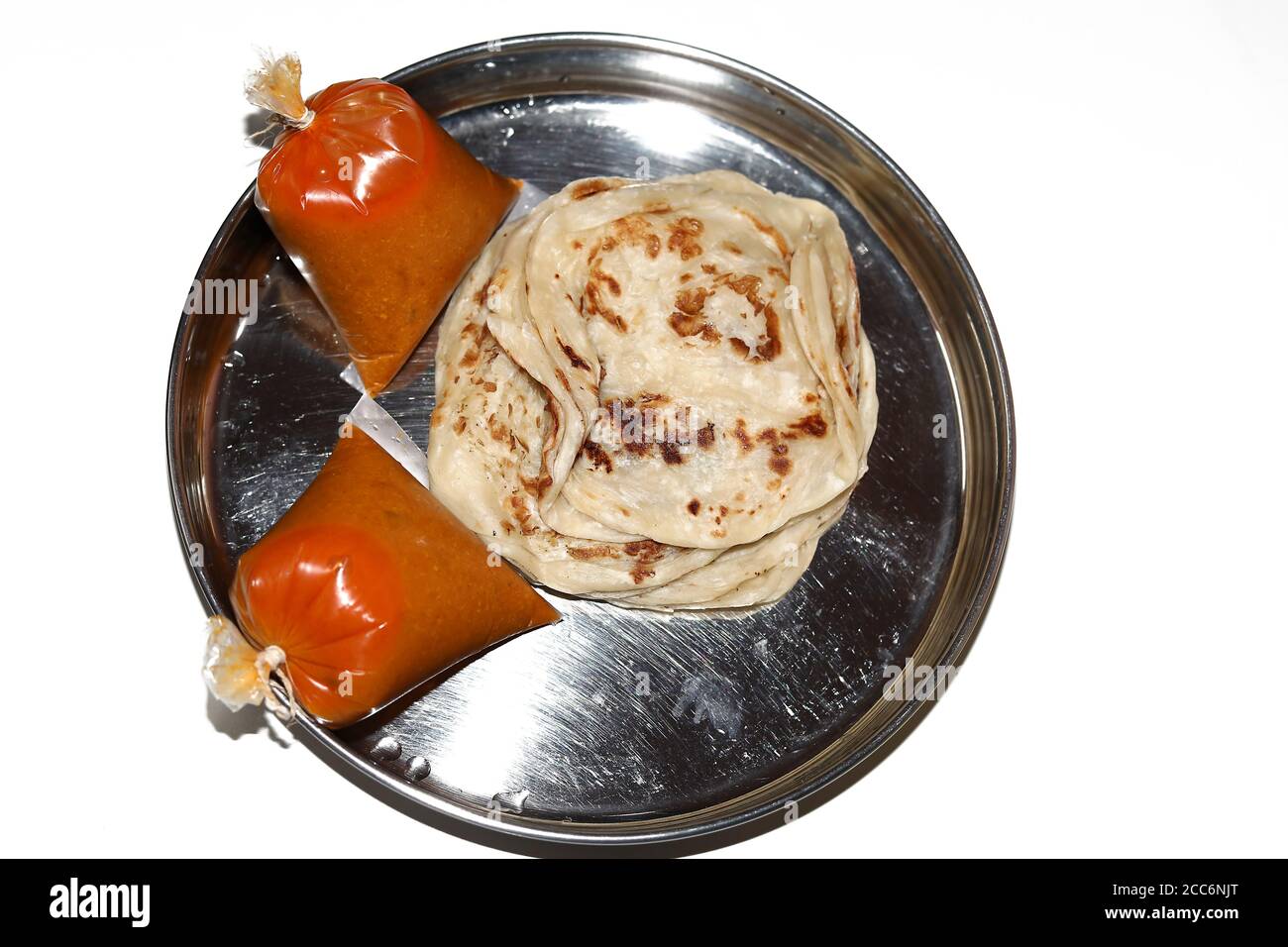 Parotta with Chicken kurma, paratha kurma is a delicacy from the state ...