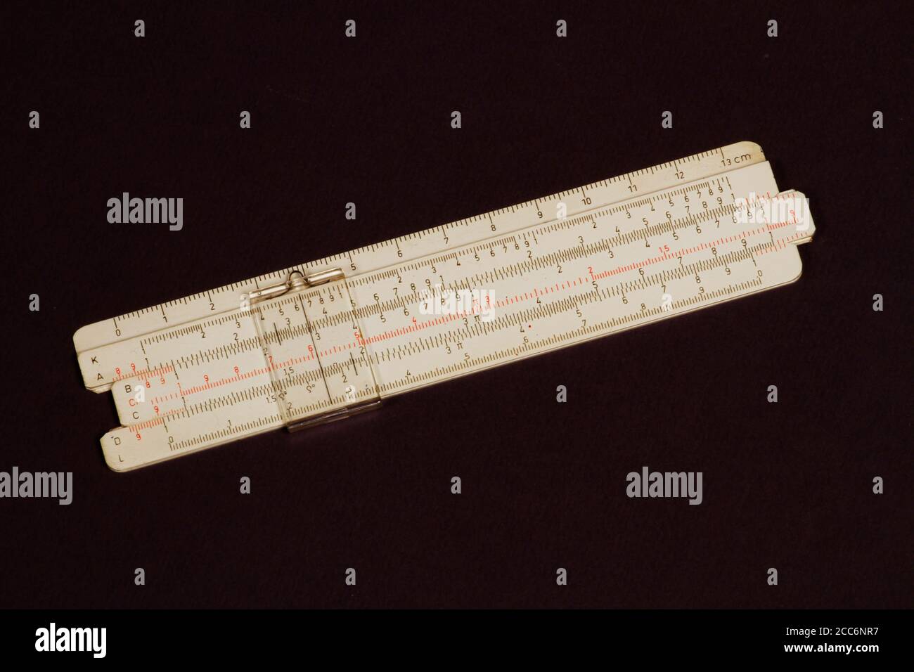 Logarithmic ruler on a colored background. Stationery for engineers and ...