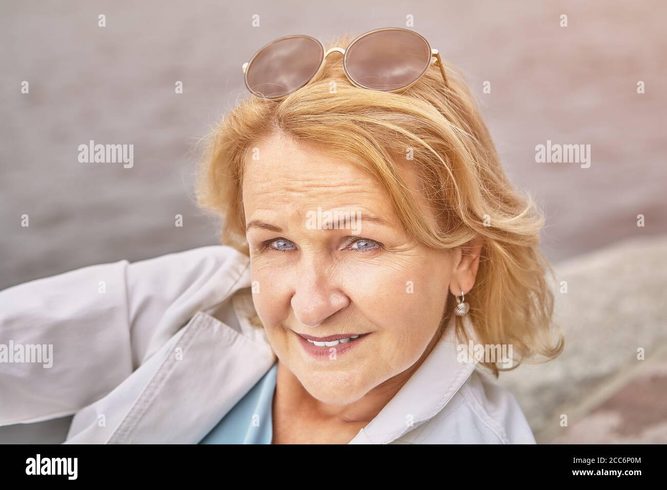 Attractive senior active caucasian woman about 62 years old with blond ... Attractive senior active caucasian woman about 62 years old with blond ...