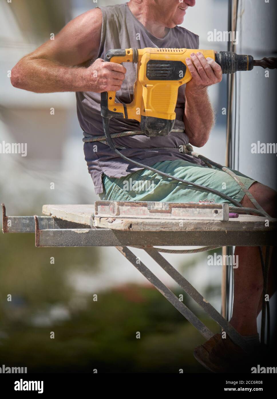 older man doing heavy work Stock Photo - Alamy