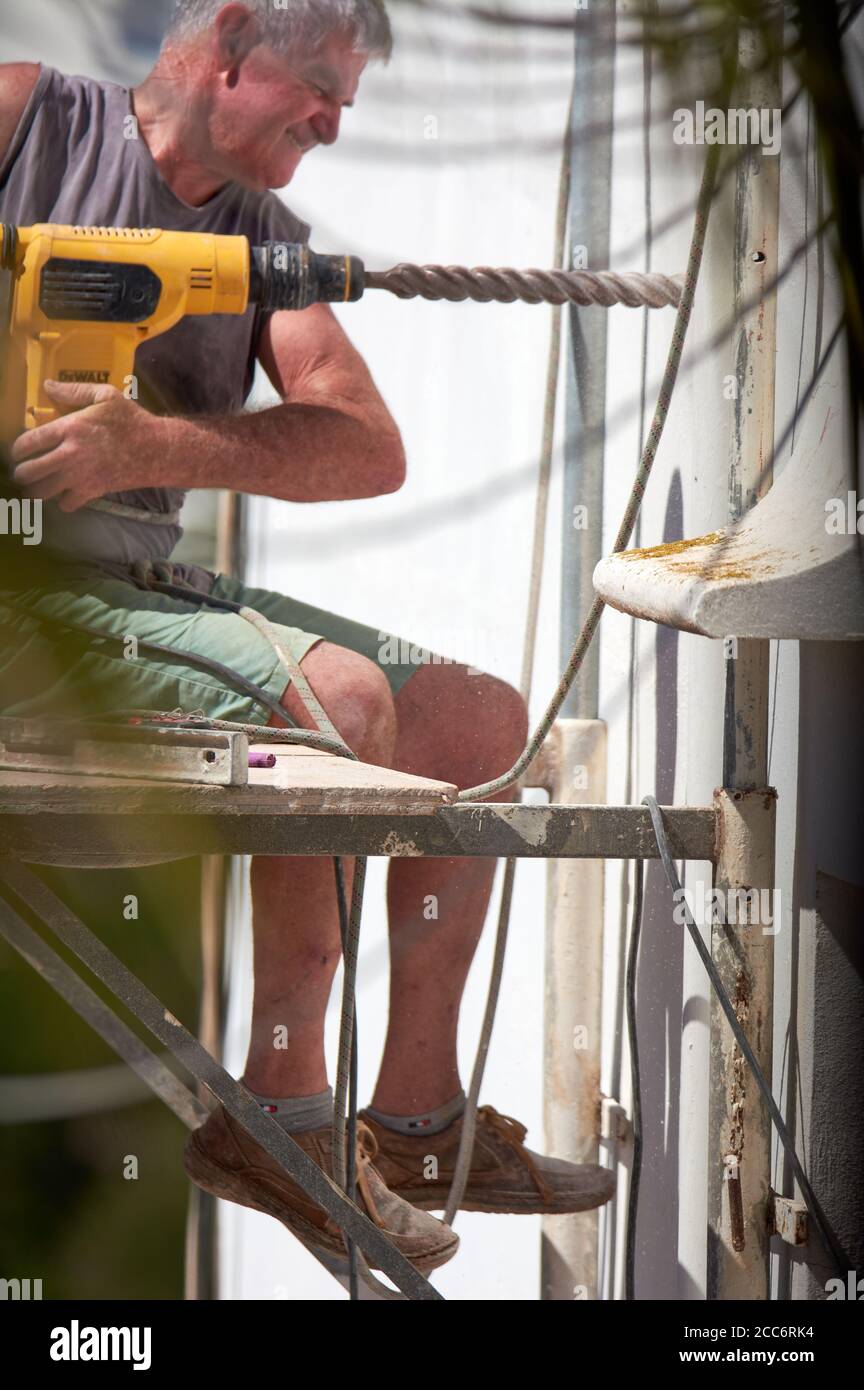 older man doing heavy work Stock Photo - Alamy