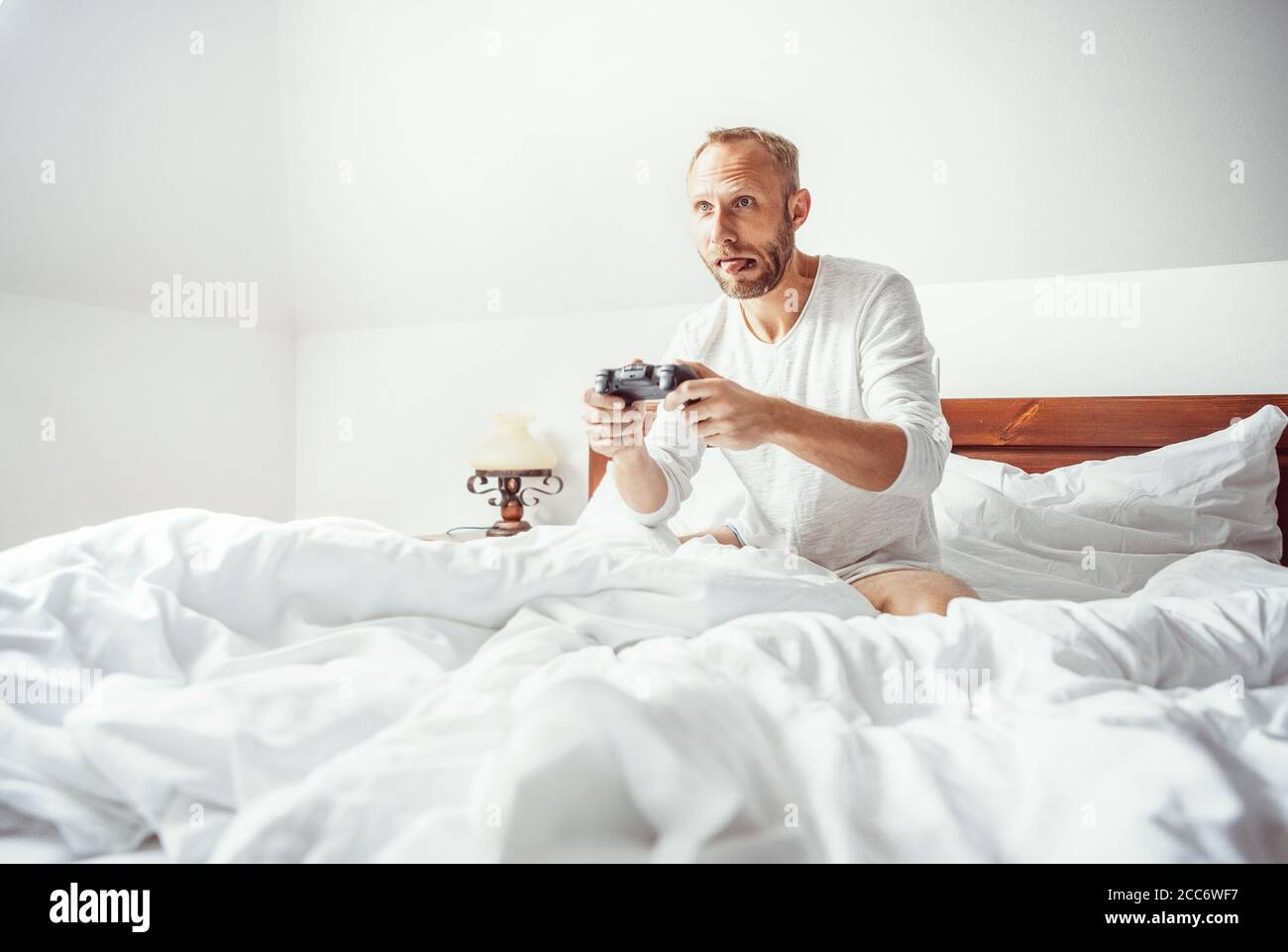 Boy gaming in bedroom hi-res stock photography and images - Alamy