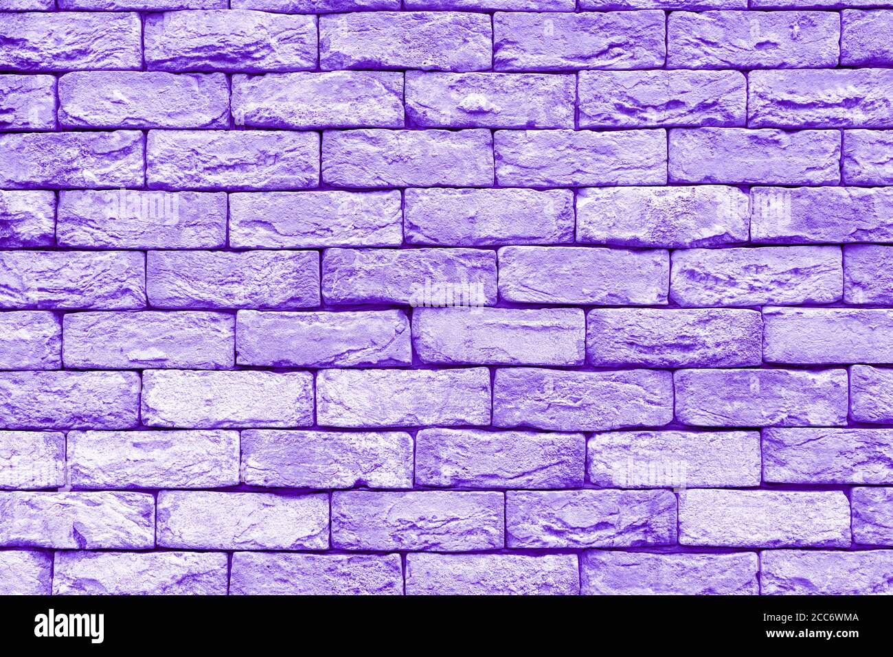 Violet brick building wall. Interior of a modern loft. Background for ...