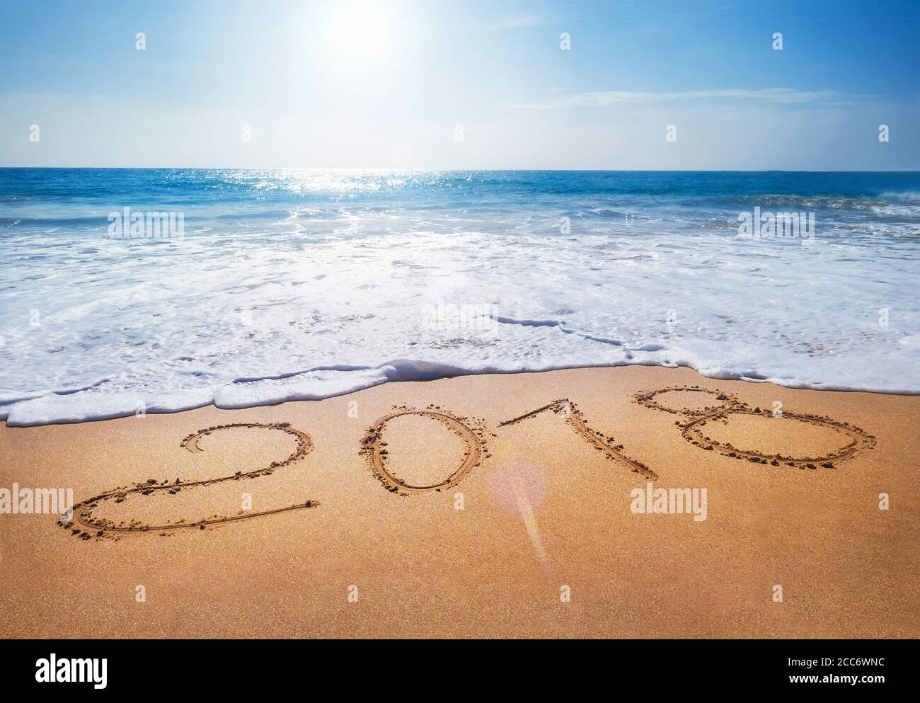 Old Year 2018 expires concept sandy tropical . ocean beach lettering ...