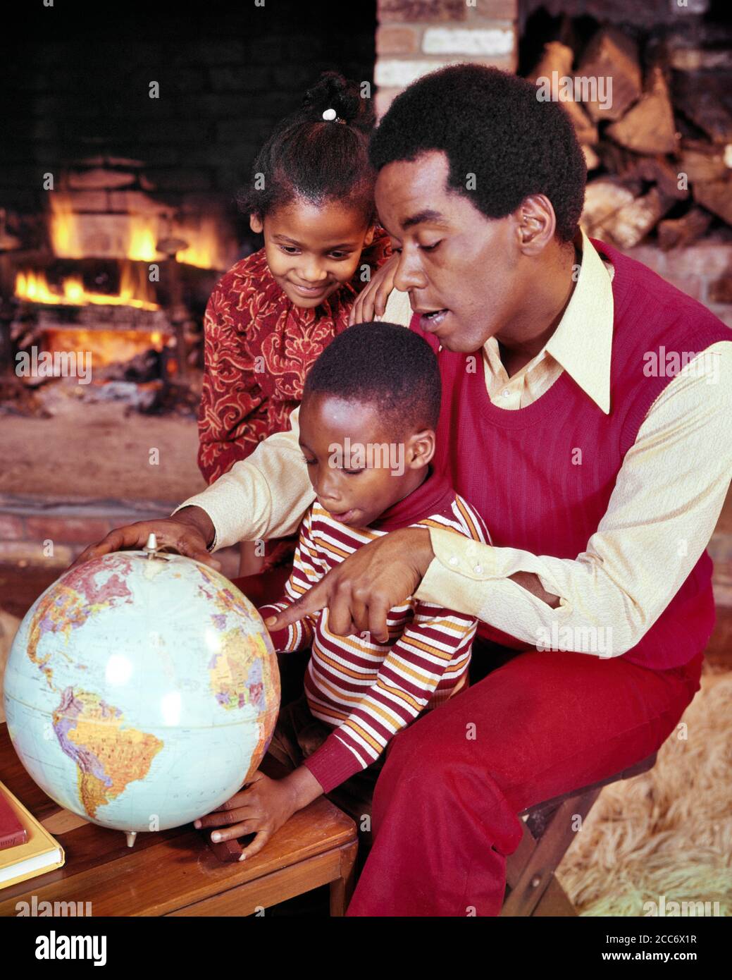 Parents teaching children retro hi-res stock photography and images - Alamy