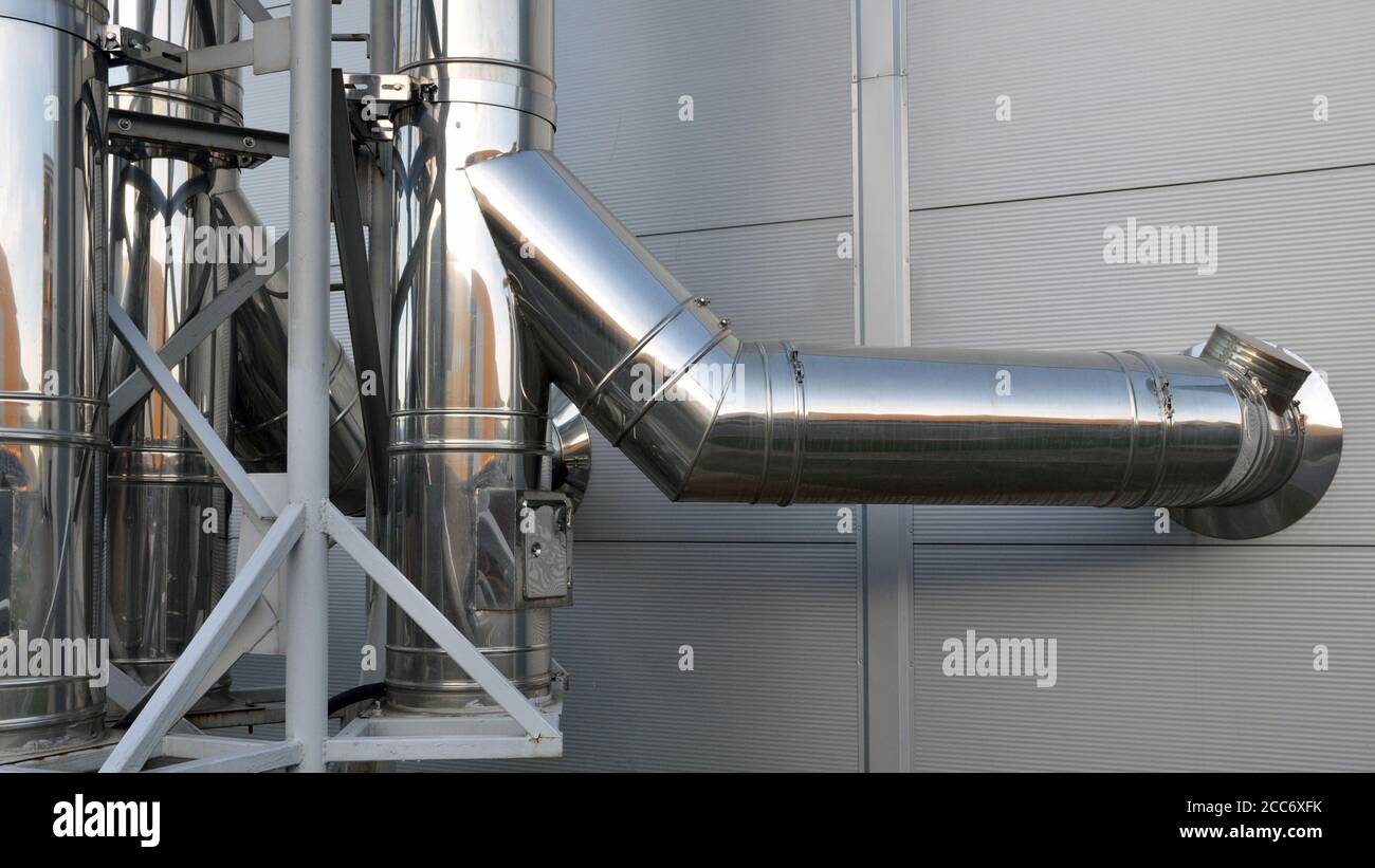Pipes for removing waste gases from an industrial facility Stock Photo ...