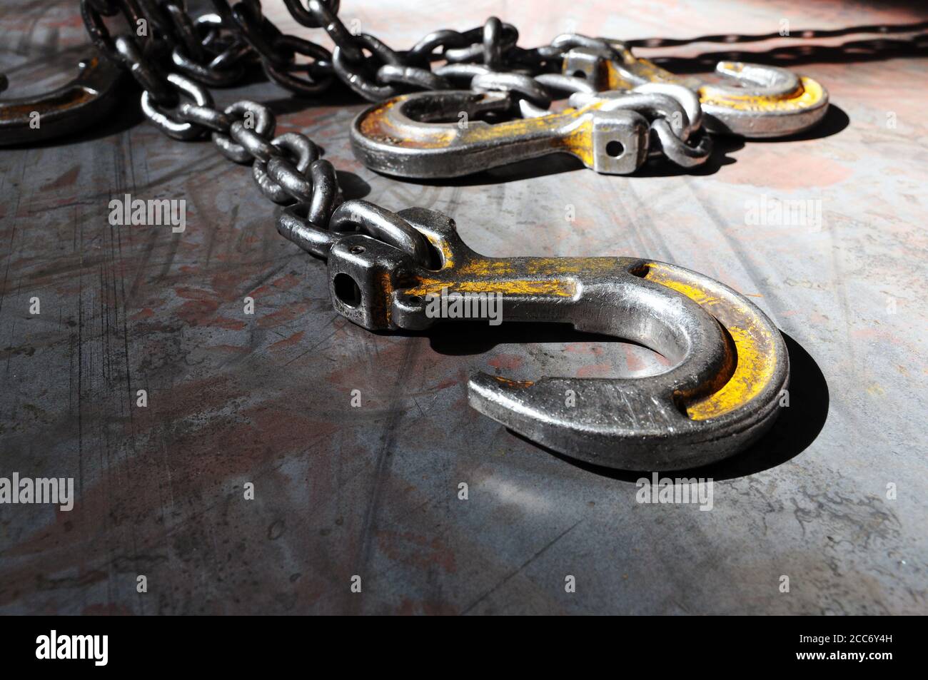 Load chain sling on sheet steel. Steel chain and crane hooks Stock ...