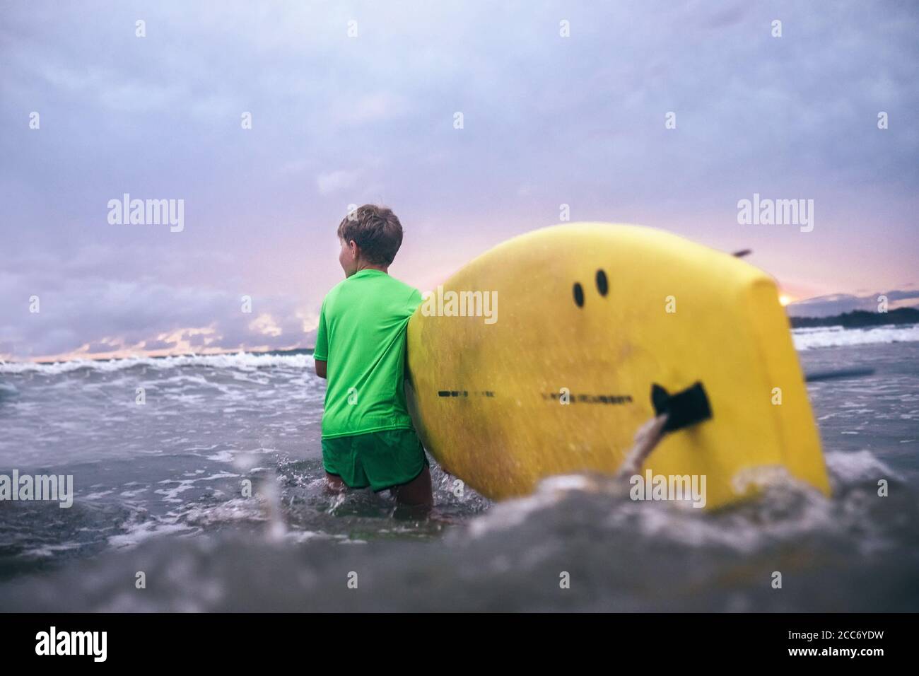 Children surfing waves blue hi-res stock photography and images - Alamy