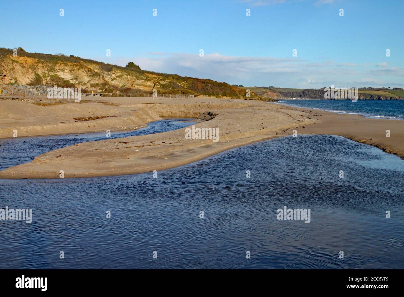 The beach at Carlyon Bay in Cornwall. Close by is the now derelict ...