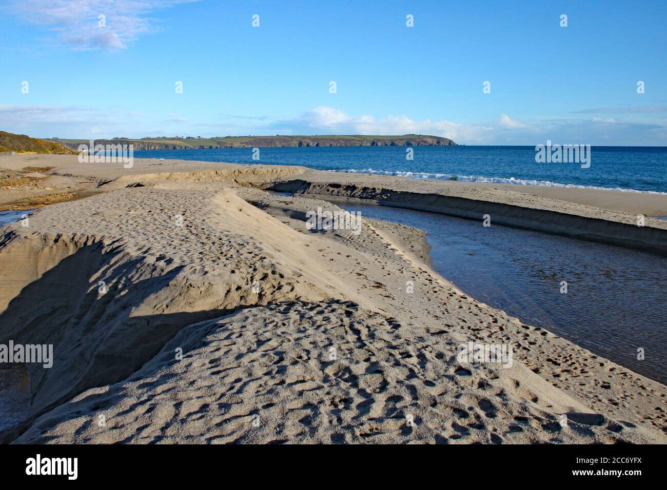 The beach at Carlyon Bay in Cornwall. Close by is the now derelict ...