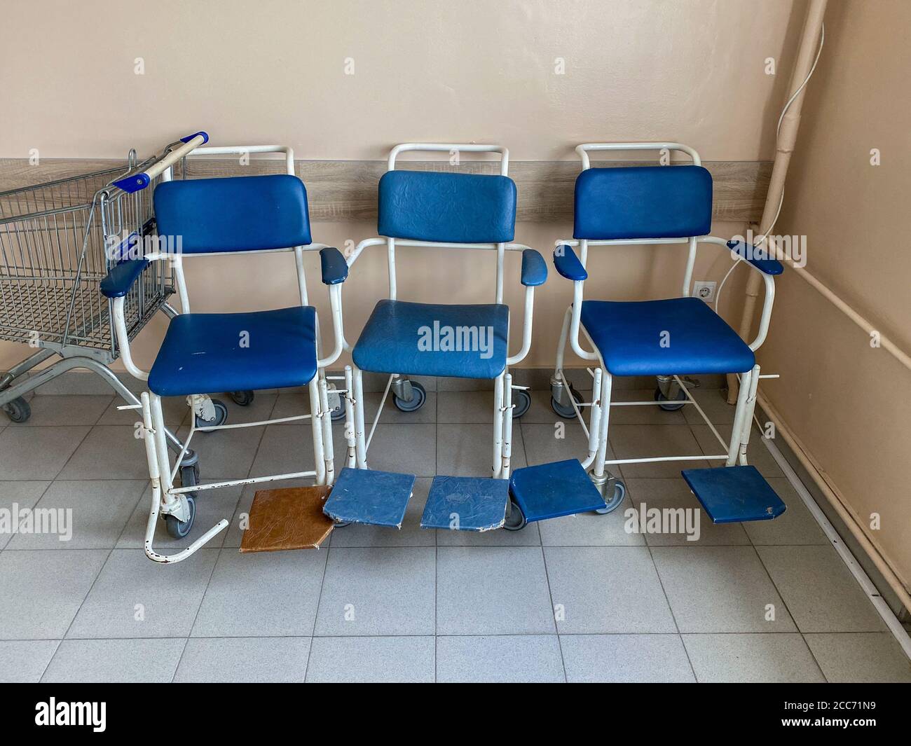 Three wheelchair in the corridor of the hospital, horizontal ...