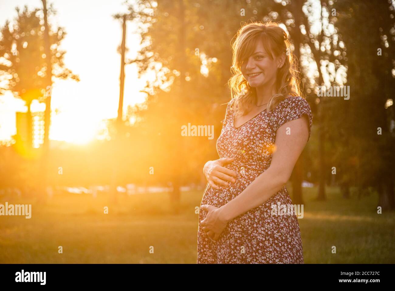 Arms around your stomach hi-res stock photography and images - Alamy