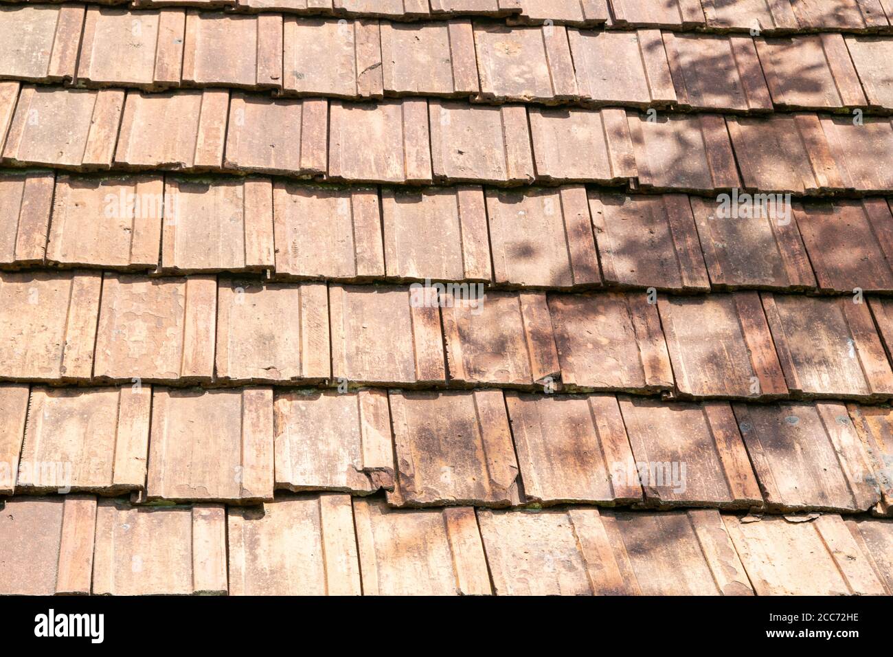 Old red and orange weathered roof tiles texture. Close-up Stock Photo ...