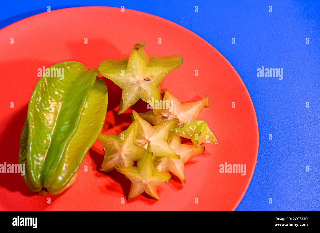 Carambola fruit. Star fruit. Carambola is an exotic fruit with a marked ...