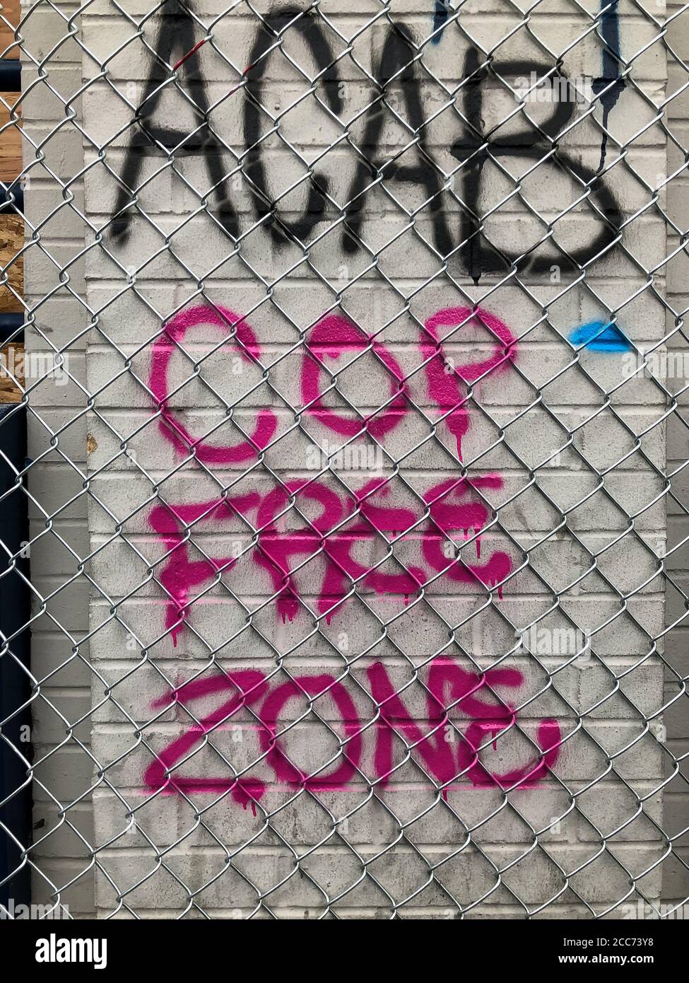 Seattle, USA – Jun 9, 2020: Signs and art at CHAZ late in the day on ...