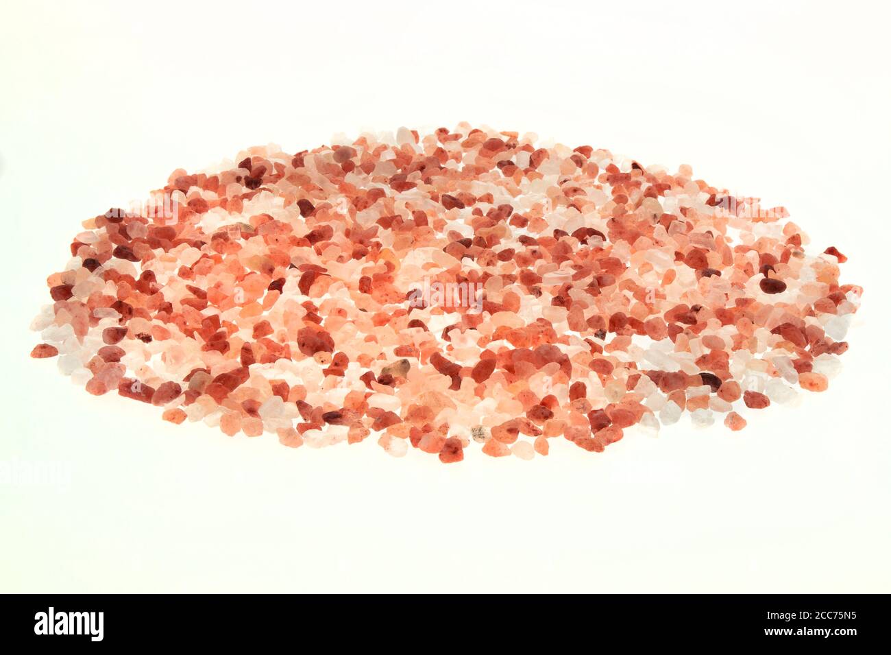 Pink salt isolated on white background. Pink Himalayan salt on white ...
