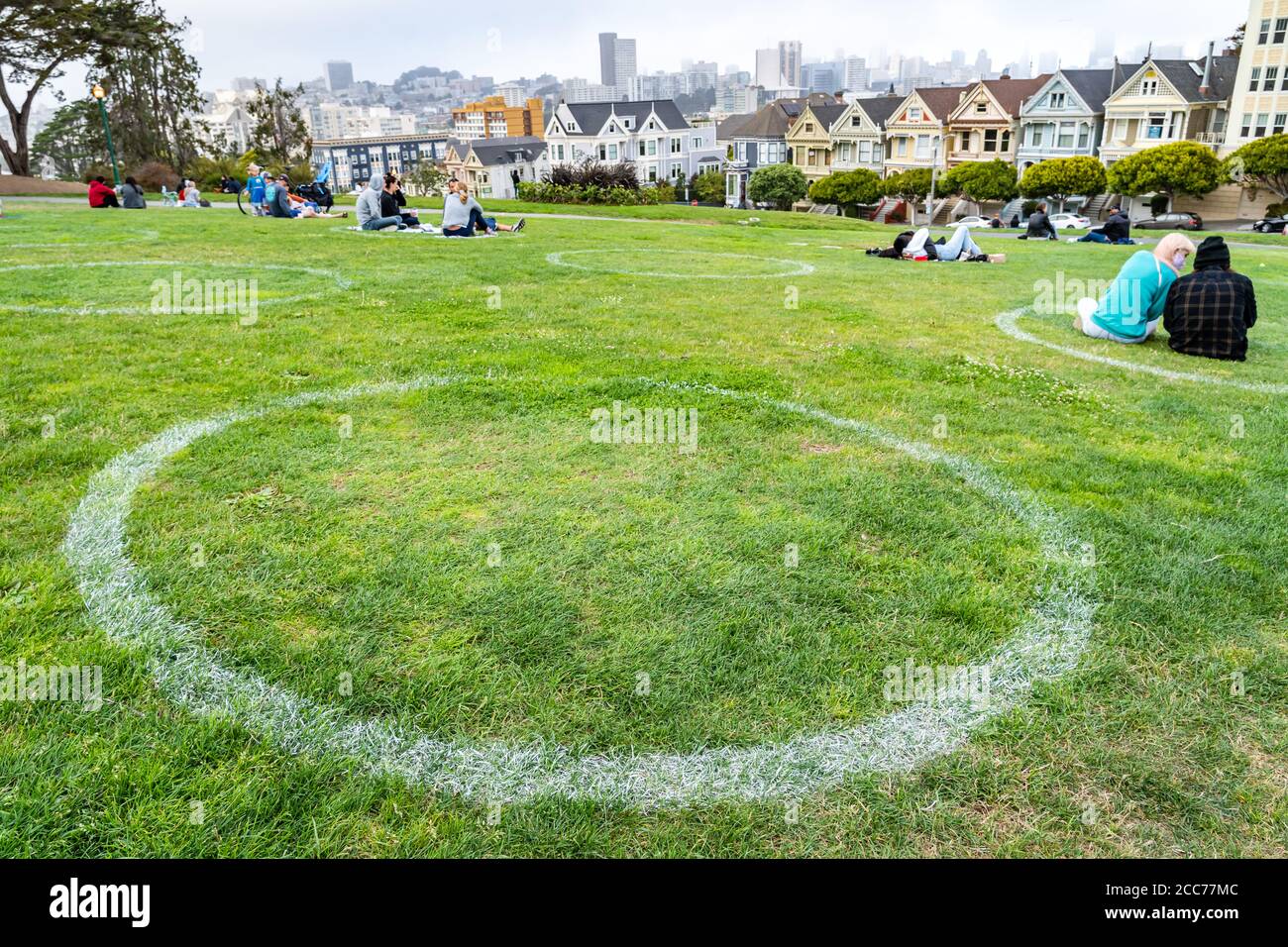 Social distancing at Alamo Square park across from the painted ladies ...