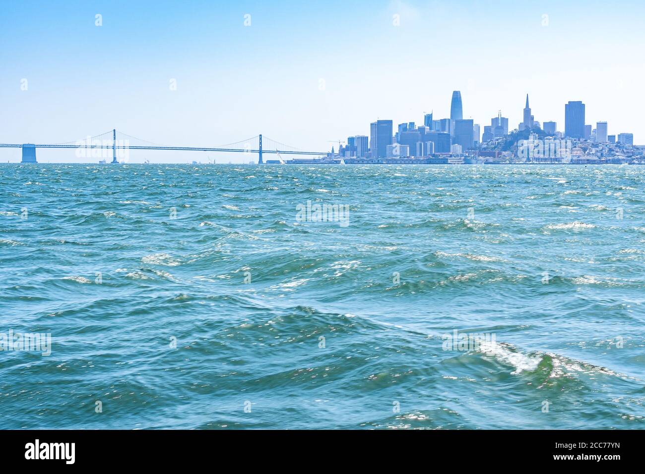 Downtown San Francisco skyline with Bay Bridge view from the Bay Stock ...