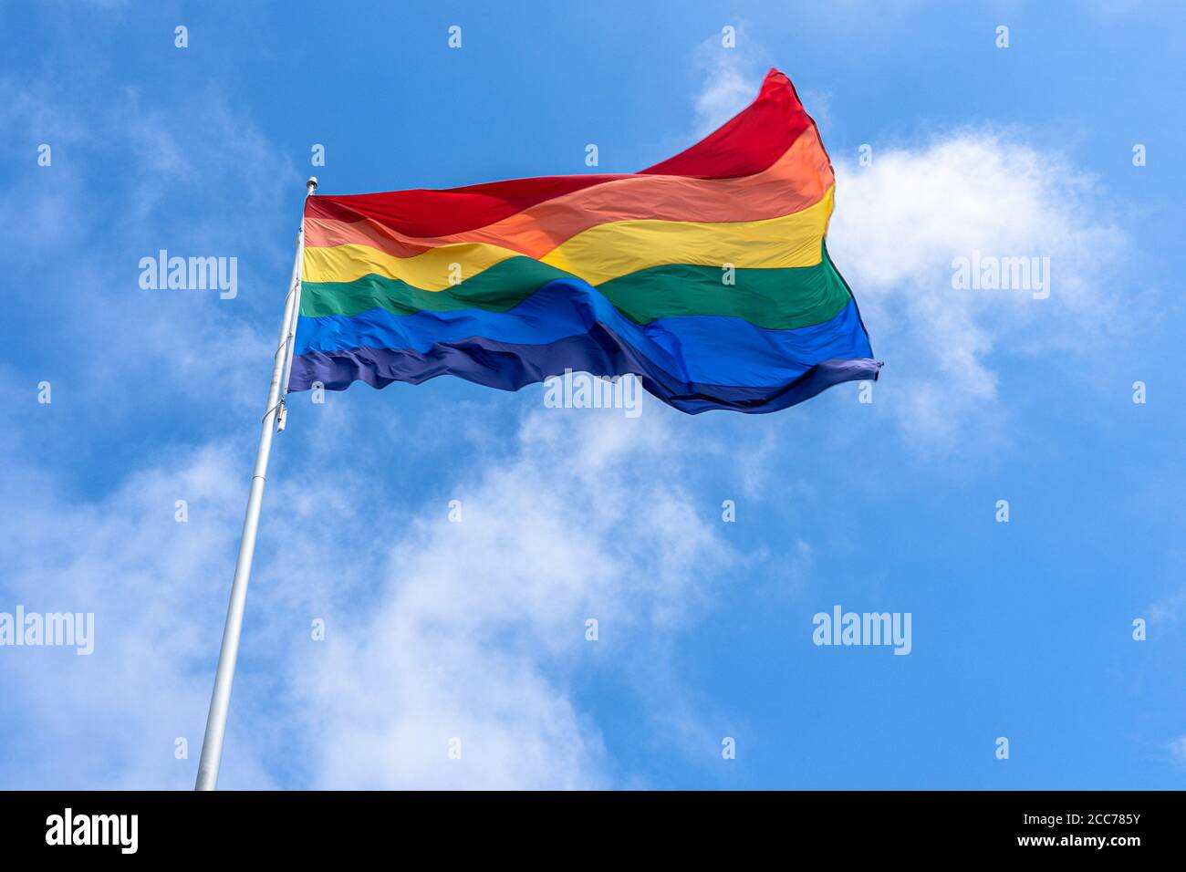 Large rainbow flag, symbol of gay pride, flying high in San Francisco ...