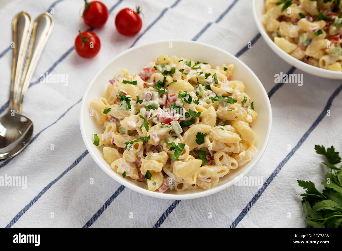 Homemade Macaroni Salad in white bowls, side view Stock Photo - Alamy