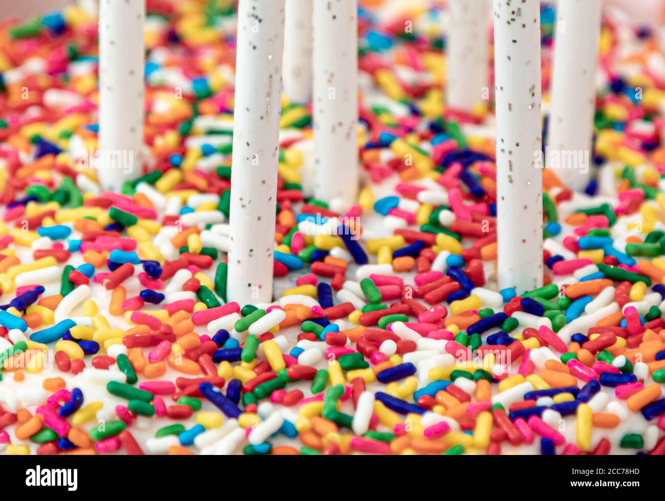 detail image of candy sprinkles on a birthday cake Stock Photo - Alamy