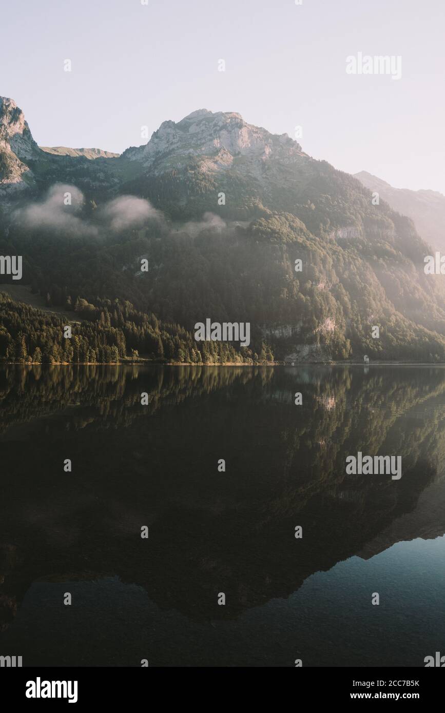 The perfect mirror happens as the sun rises Stock Photo - Alamy