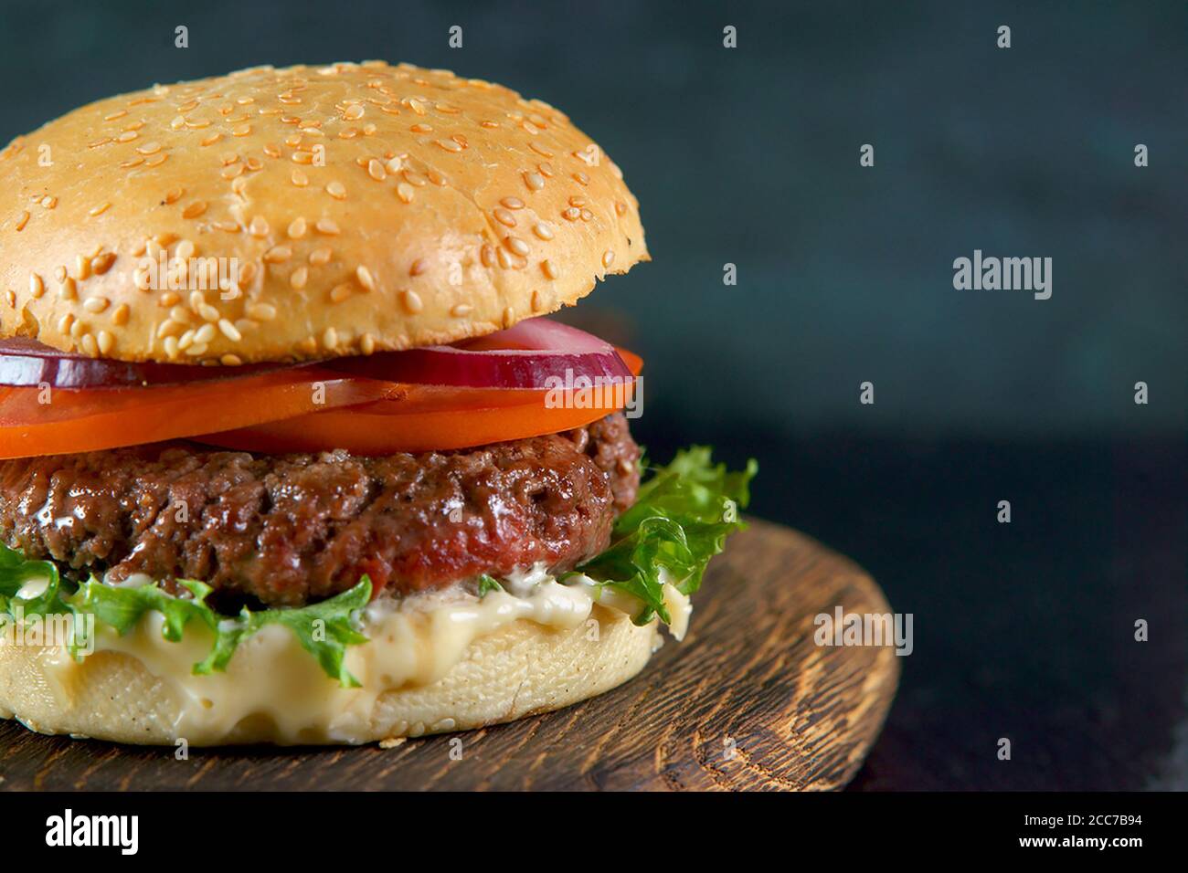 Burger on a dark background.jpg Stock Photo - Alamy