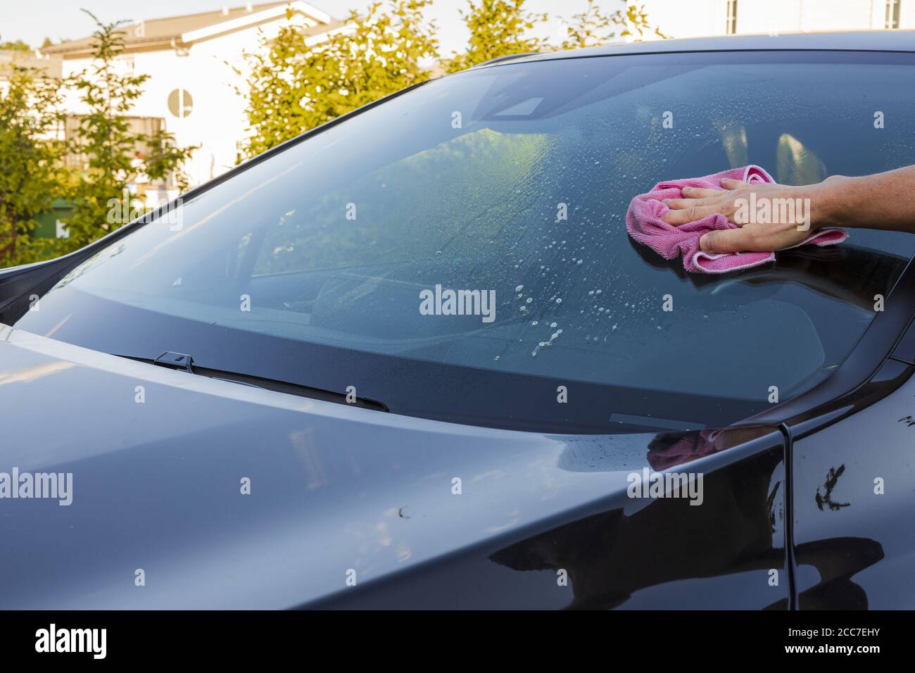 Man washing front windshield vehicle hi-res stock photography and ...